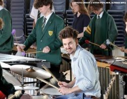 Teacher hits the high notes